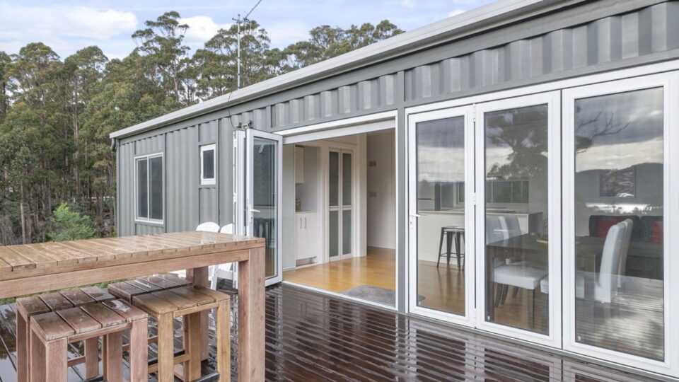 Introducing An All-White Container House Overlooking the Ocean That ...