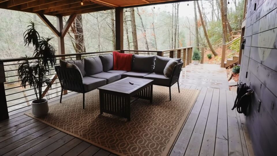 Experience a Riverside Getaway with Blockbuster Vibes in a Tiny Hideaway